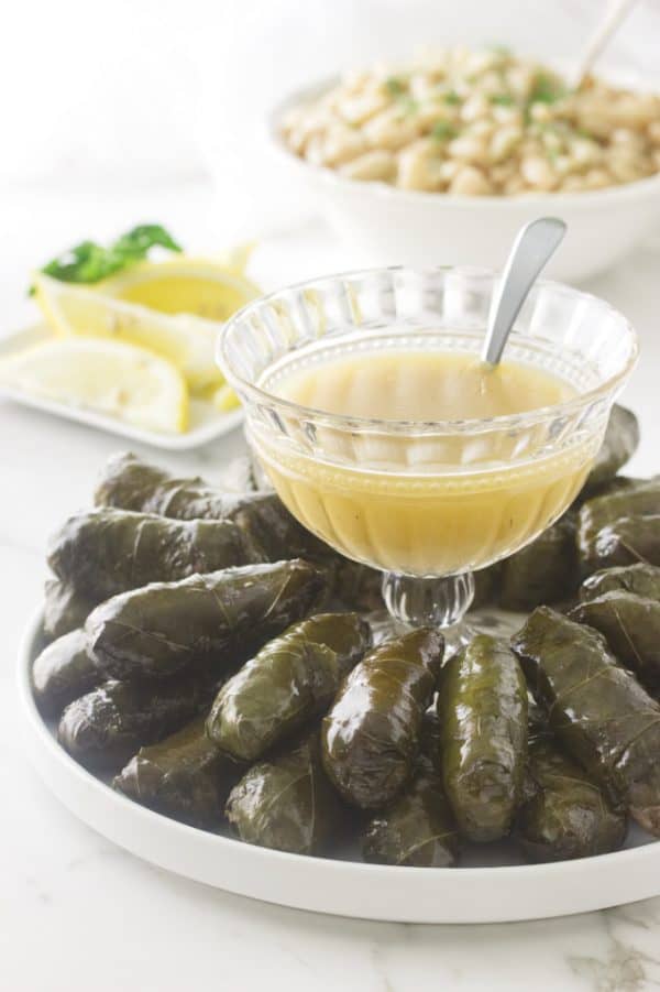 Meat Stuffed Grape Leaves with Cannellini Beans - Savor the Best
